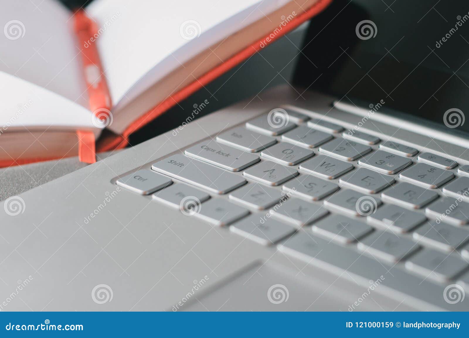 Closeup Laptop Keyboard and Opened Notebook Stock Image - Image of ...