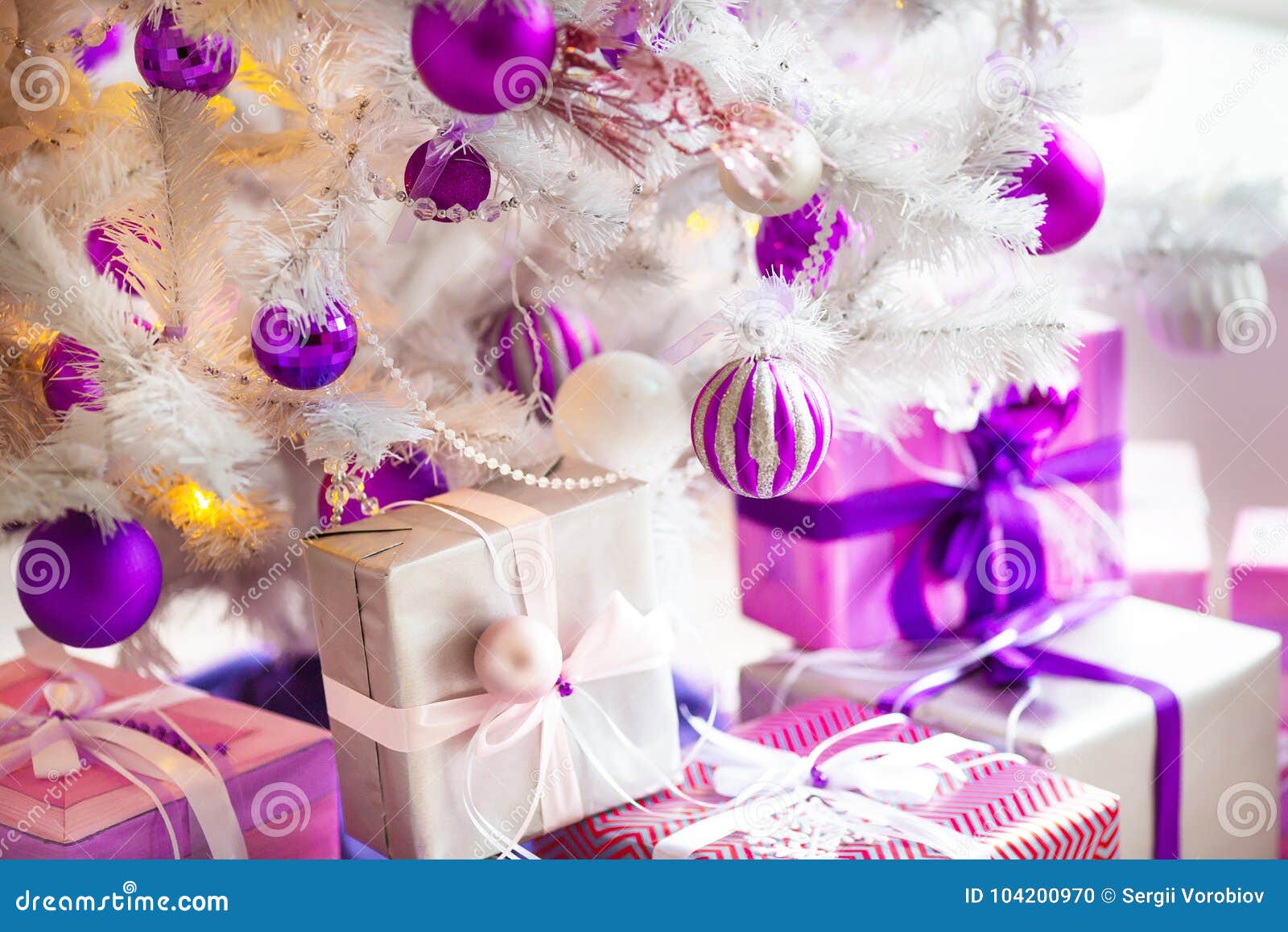 Closeup of a Large Stack of Wrapped Christmas Presents of Varying Sizes ...