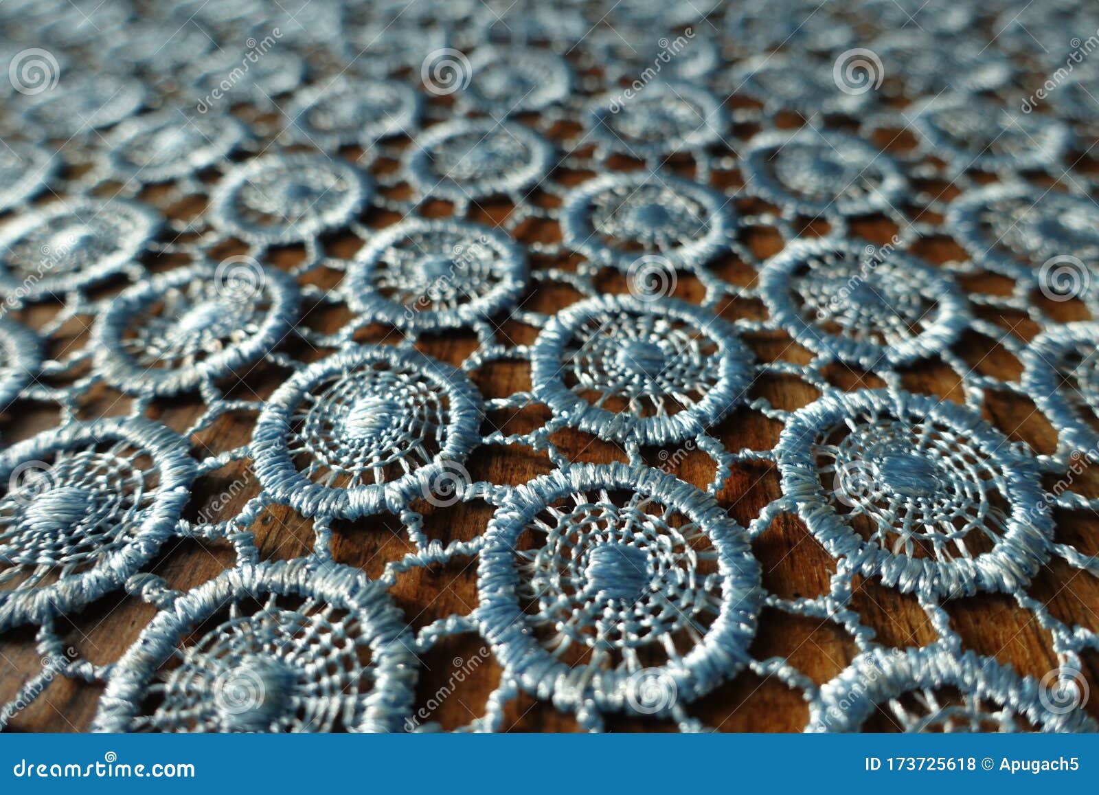 Closeup of Light Blue Crochet Lacy Fabric on Wood Stock Photo - Image ...