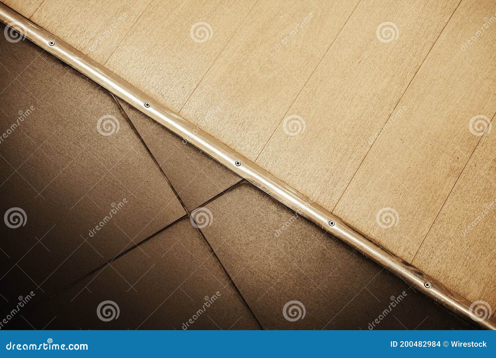 Closeup of a Linoleum Joint between a Laminate and Tile Stock Photo ...