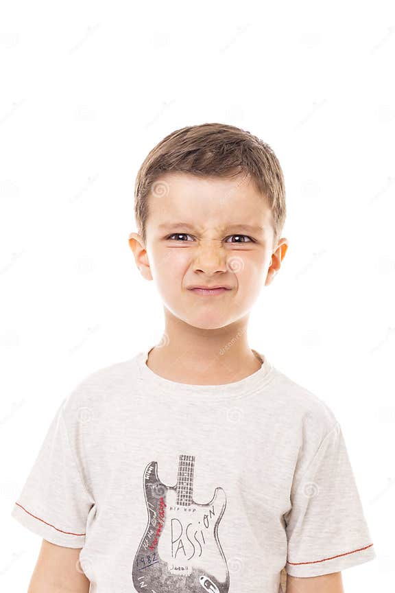 Closeup of a Little Boy with Grumpy Expression Stock Photo - Image of ...