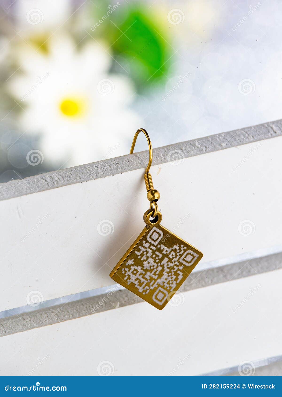 Closeup of a Luxurious, Golden Earring with a QR Code O Stock Photo ...