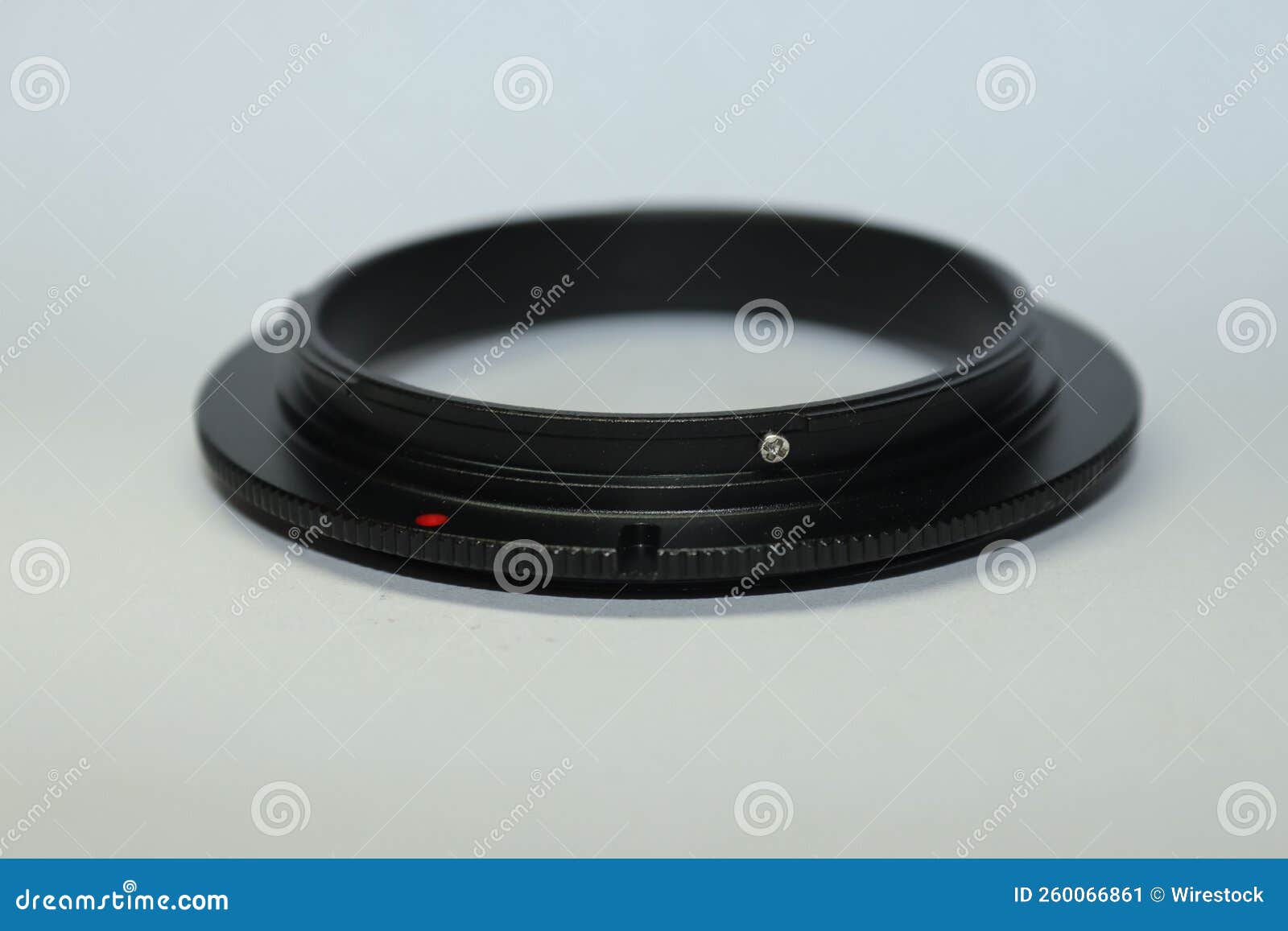 Closeup of a Macro Reverse Adapter Ring Isolated on a White Background ...