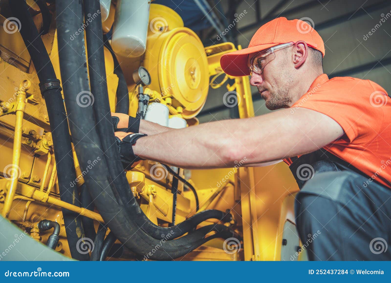 Mechanic Repairing an Excavator Engine Stock Photo - Image of equipment ...