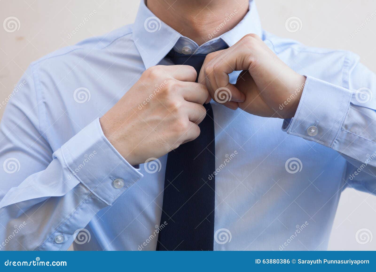 Closeup of Male Office Worker Tying a Tie Stock Photo - Image of bowtie ...
