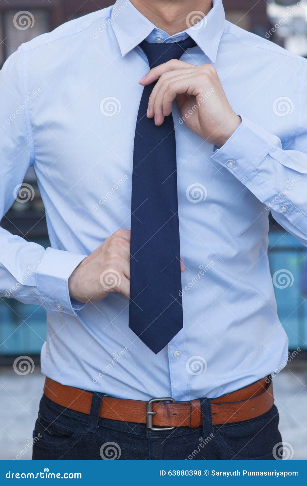 Closeup of Male Office Worker Tying a Tie Stock Photo - Image of ...