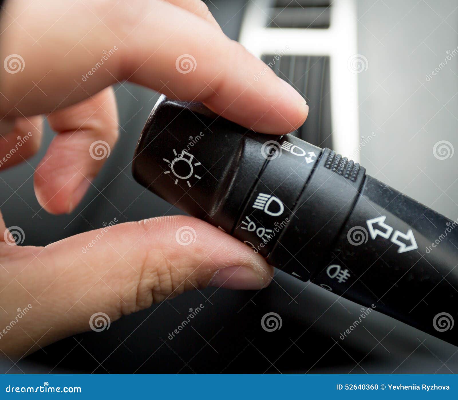 Closeup of Man Adjusting Light Control Toggle in Car Stock Photo ...