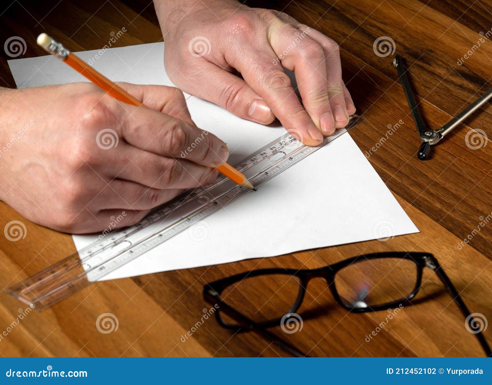 Closeup of Man Hands Holding Pencil and a Ruler. Working Environment on ...