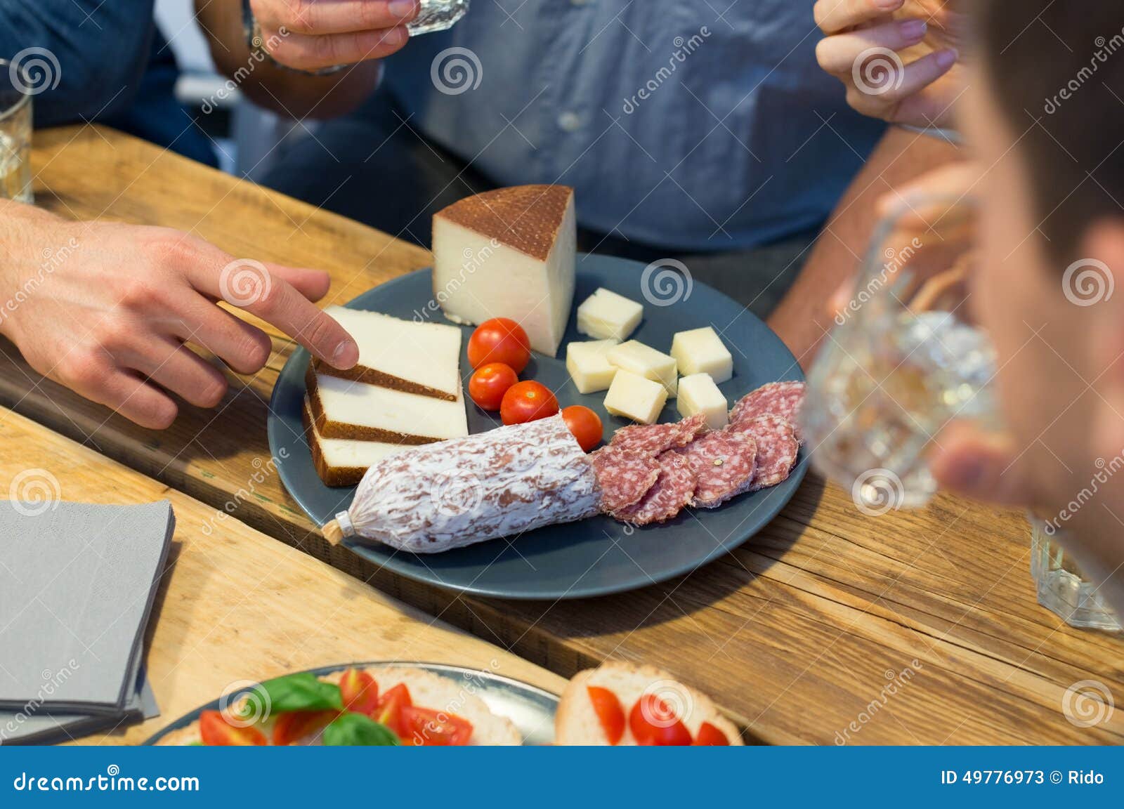 Closeup of Man Picking Cheese Slice Stock Image - Image of lunch, diet ...