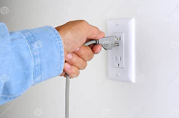 Closeup Man with Plug and Outlet Stock Photo - Image of connection ...