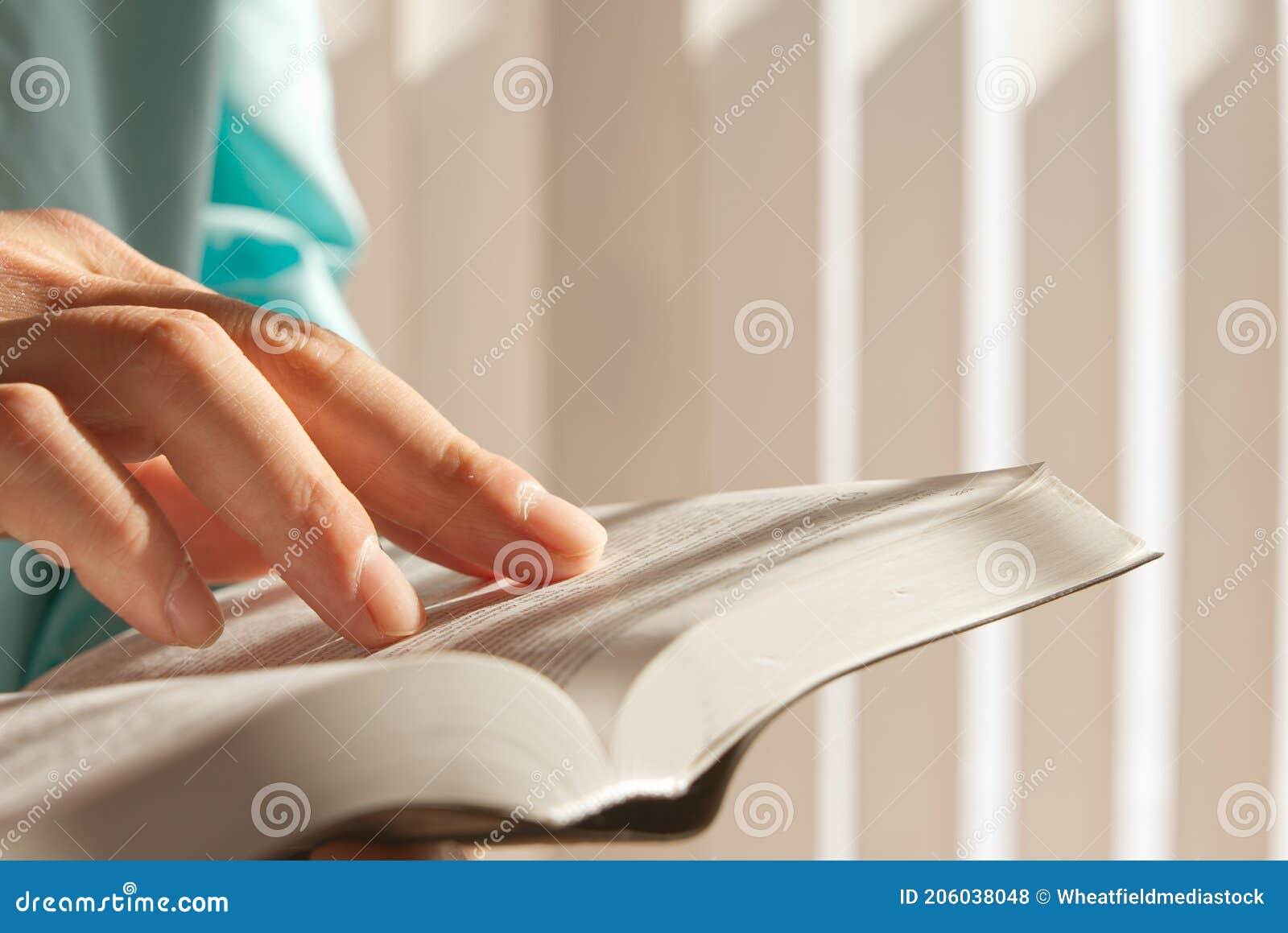 Closeup of Man S Hands and an Open Bible, Reading the Bible at Home ...