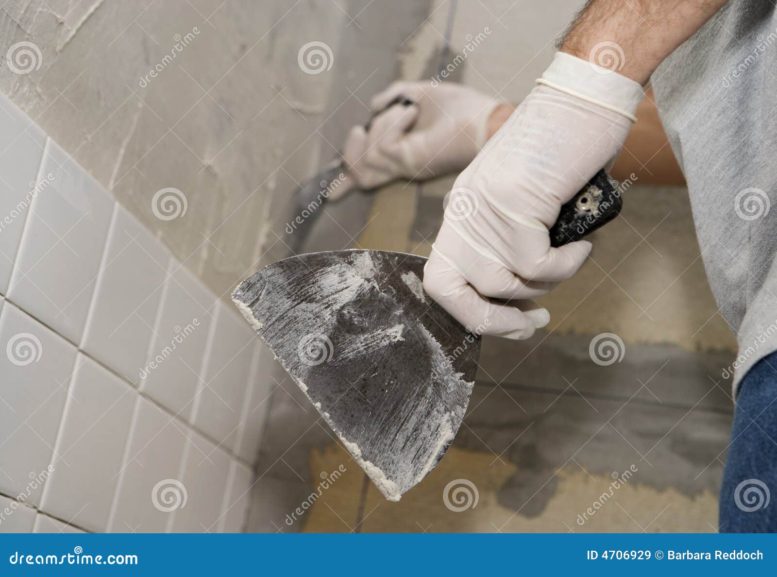 Closeup of Man Tiling a Wall Stock Image - Image of mortar, hand: 4706929