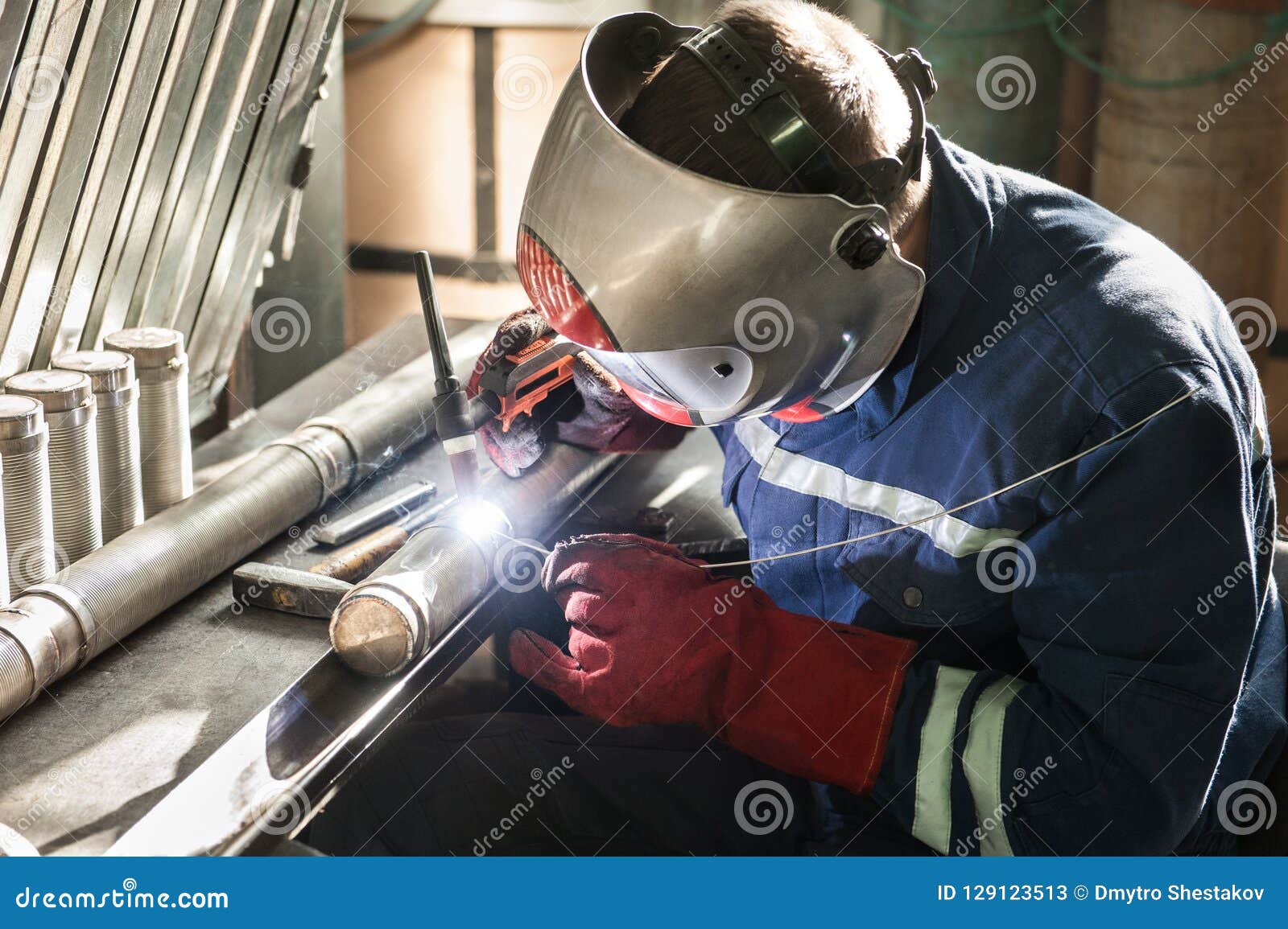Closeup of Man Wearing Mask Welding in a Workshop Stock Image - Image ...