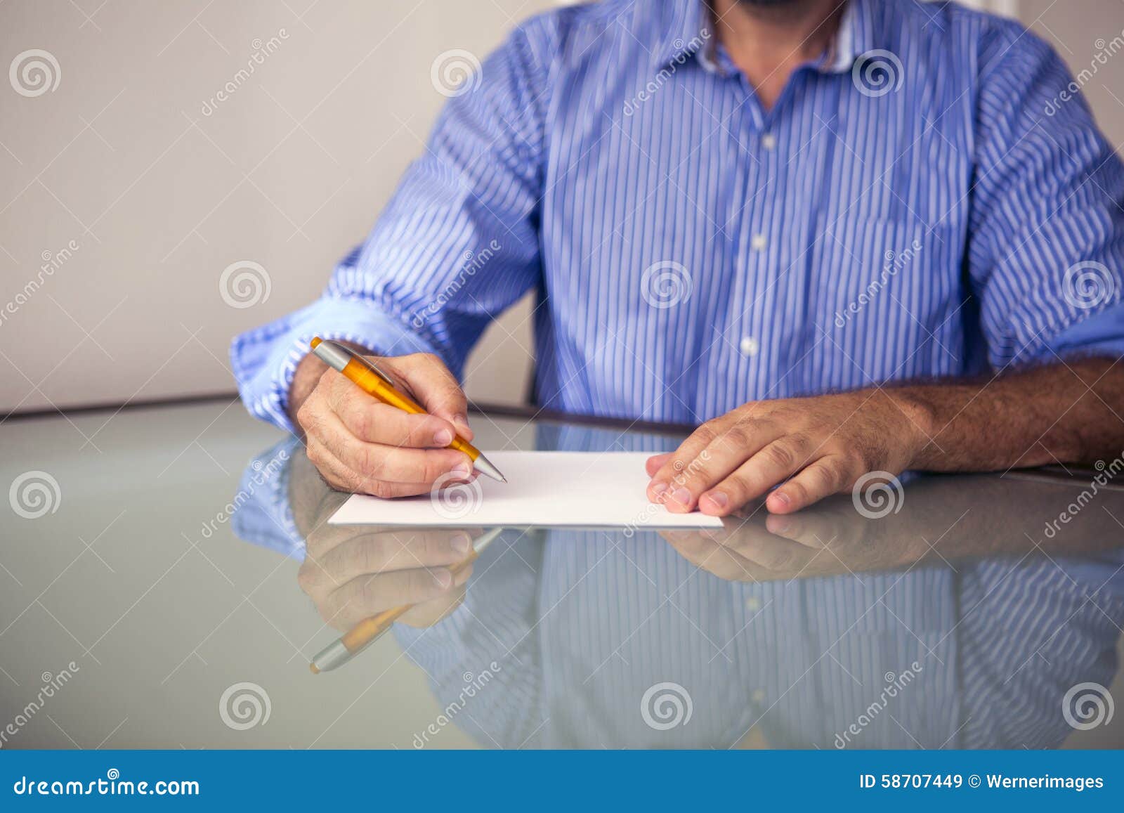 Closeup of Man Writing on a Piece of Paper Stock Image - Image of blue ...