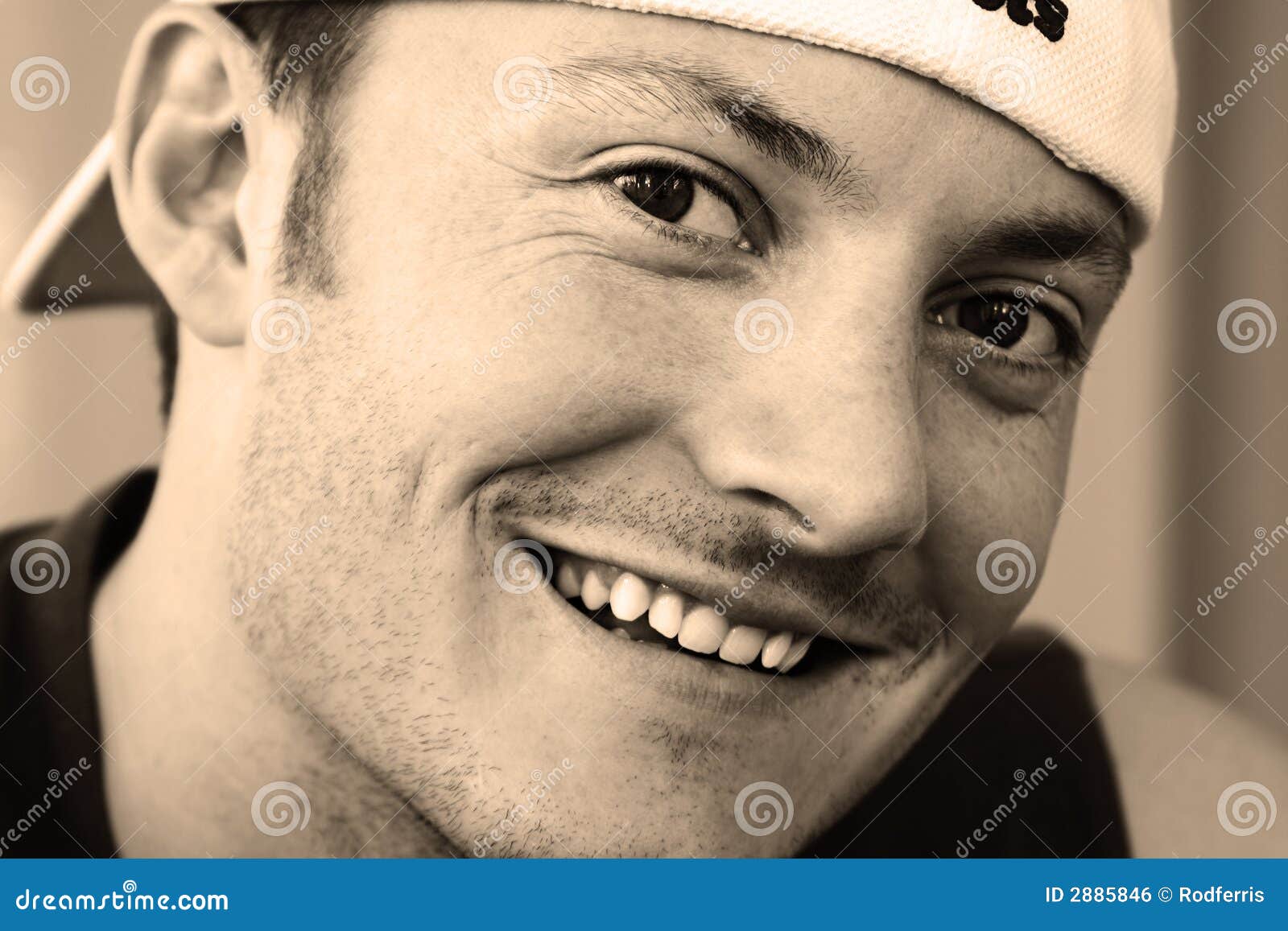 A closeup of a mans face stock photo. Image of sepia, attractive - 2885846