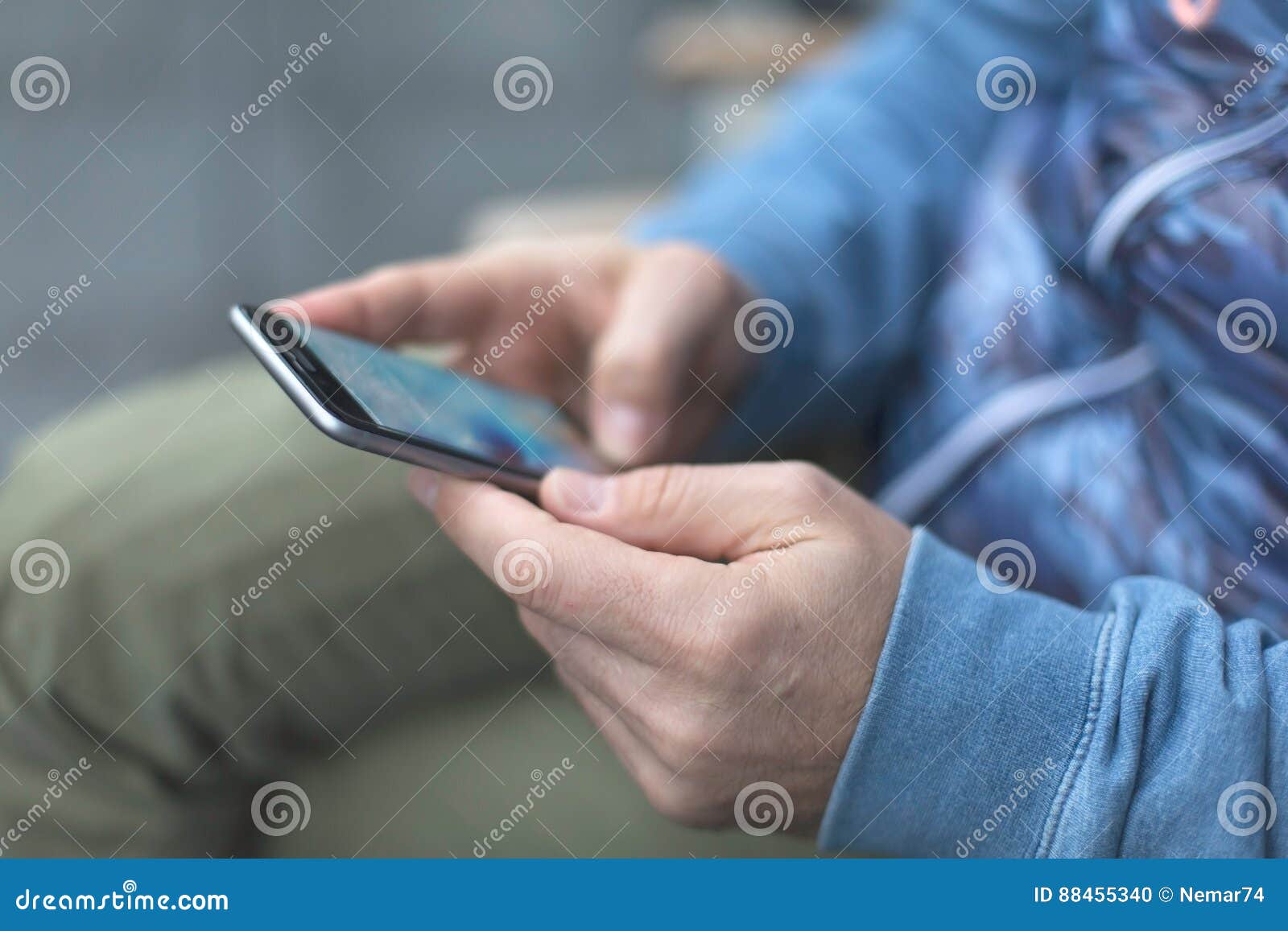 Closeup of Mans Hand Holding Cellphone. Stock Photo - Image of ...