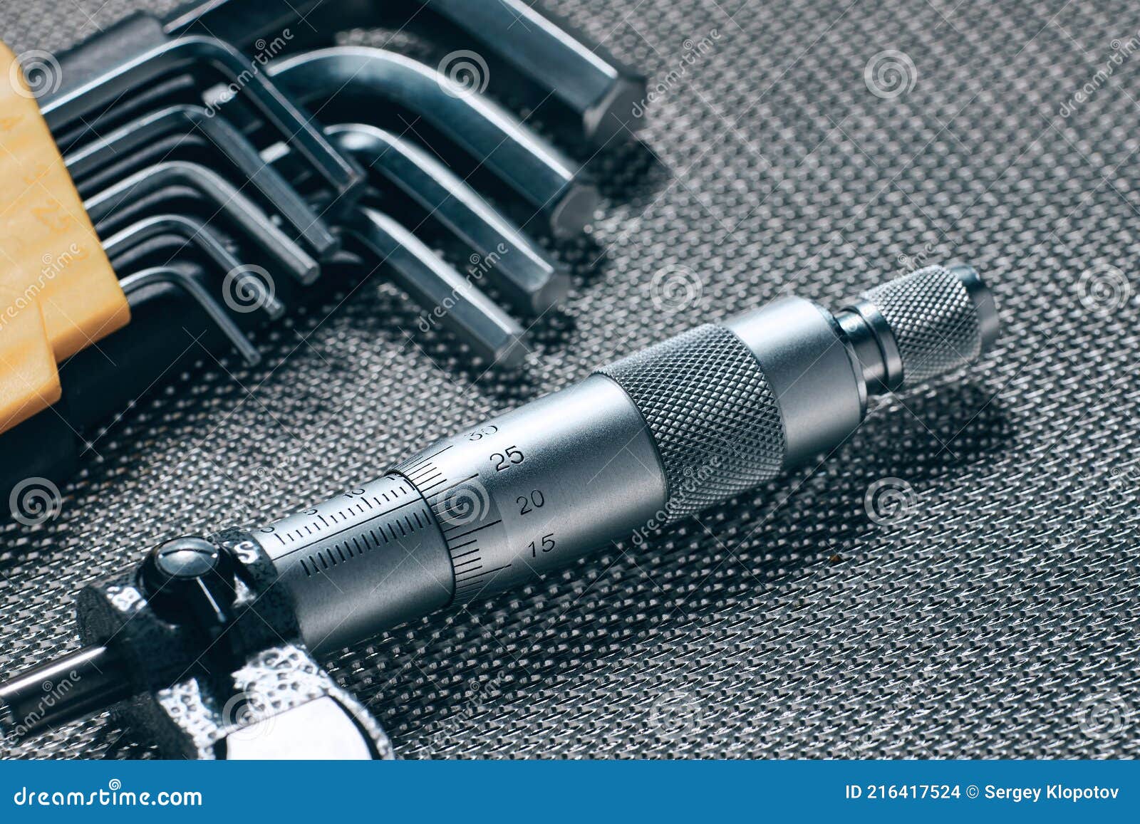 Closeup of a Mechanical Micrometer and a Set of Hex Keys Stock Photo ...
