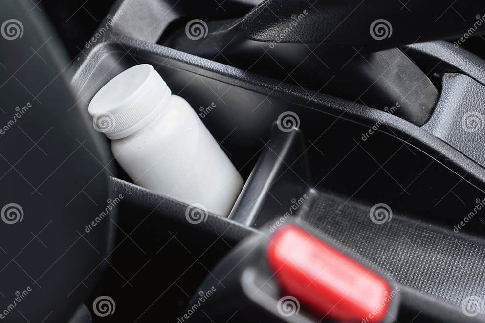 Medicine Bottle Inside a Car , Using Medication before Driving Concept ...