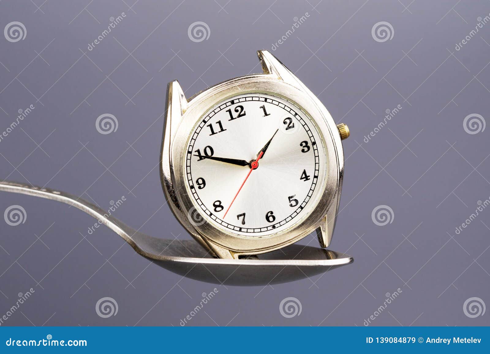 Closeup of a Metal Wristwatch without Strap on a Gray Background Stock ...