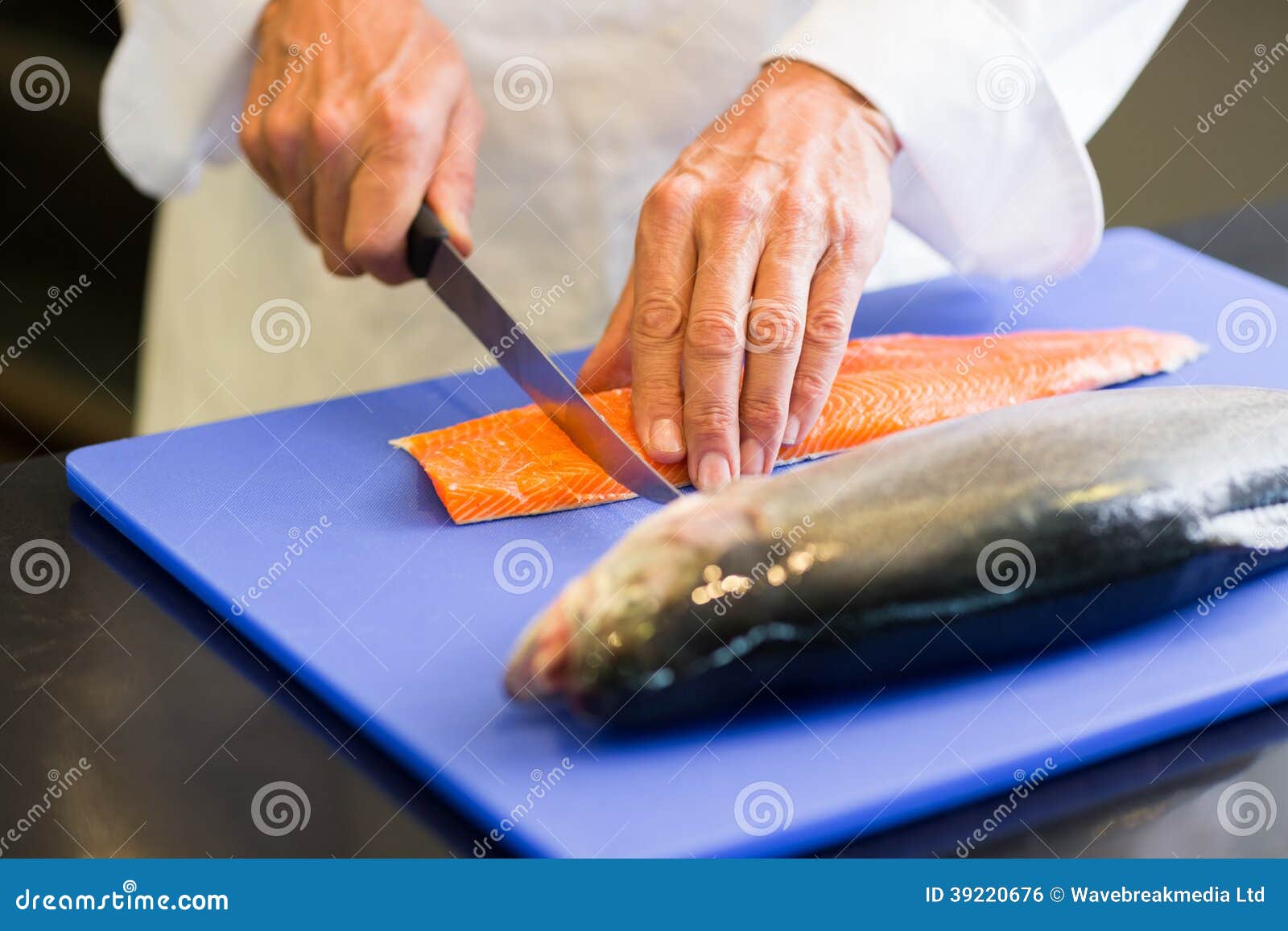 Closeup Mid Section of a Chef Cutting Fish Stock Photo - Image of ...
