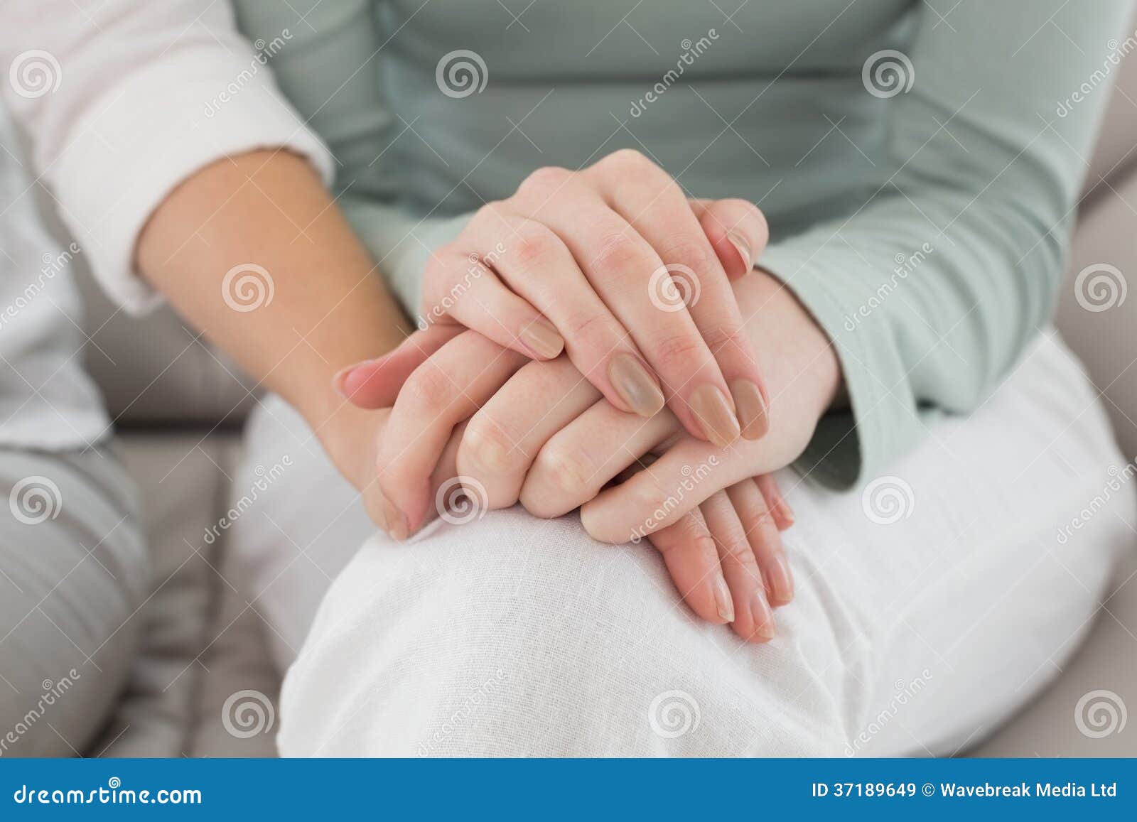 Closeup Mid Section of Female Friends Touching Hands Stock Image ...