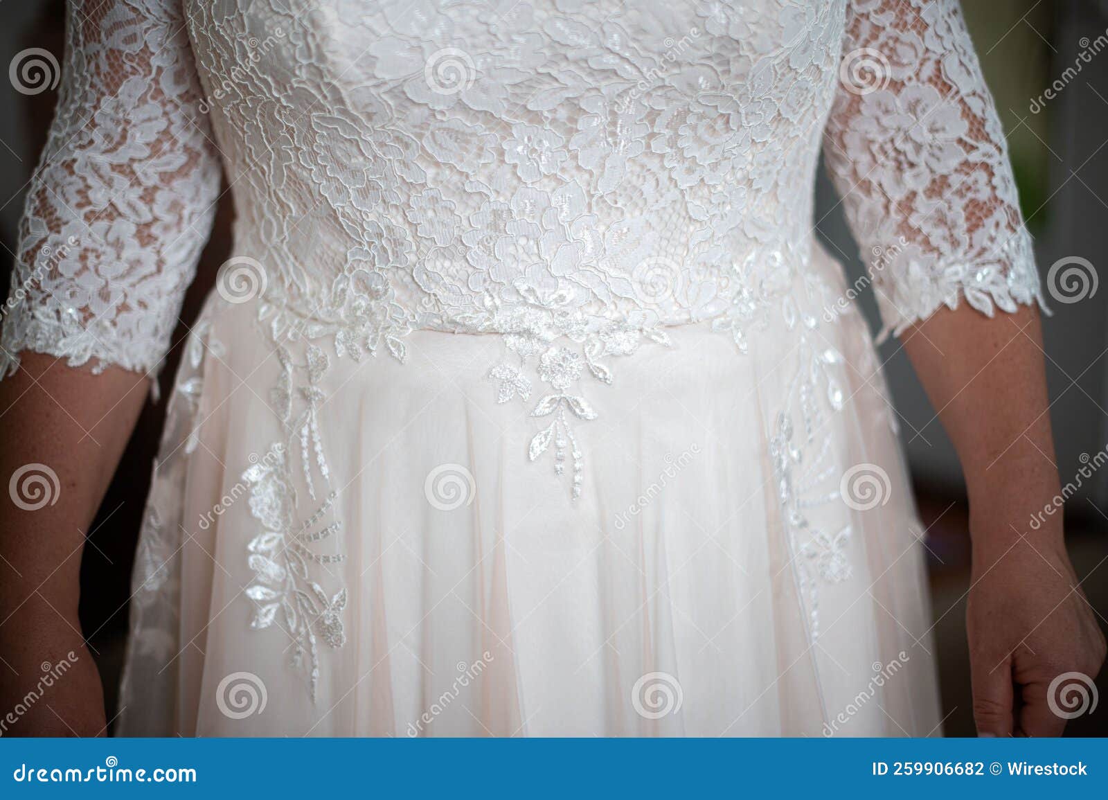 Closeup of the Midsection of a Wedding Gown Worn by a Bride Stock Photo ...