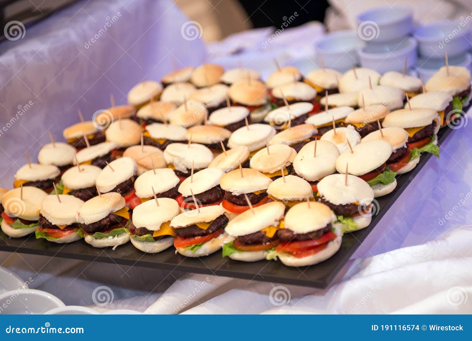 Closeup of a Mini Burger Platter on a Tablecloth Under the Lights Stock ...