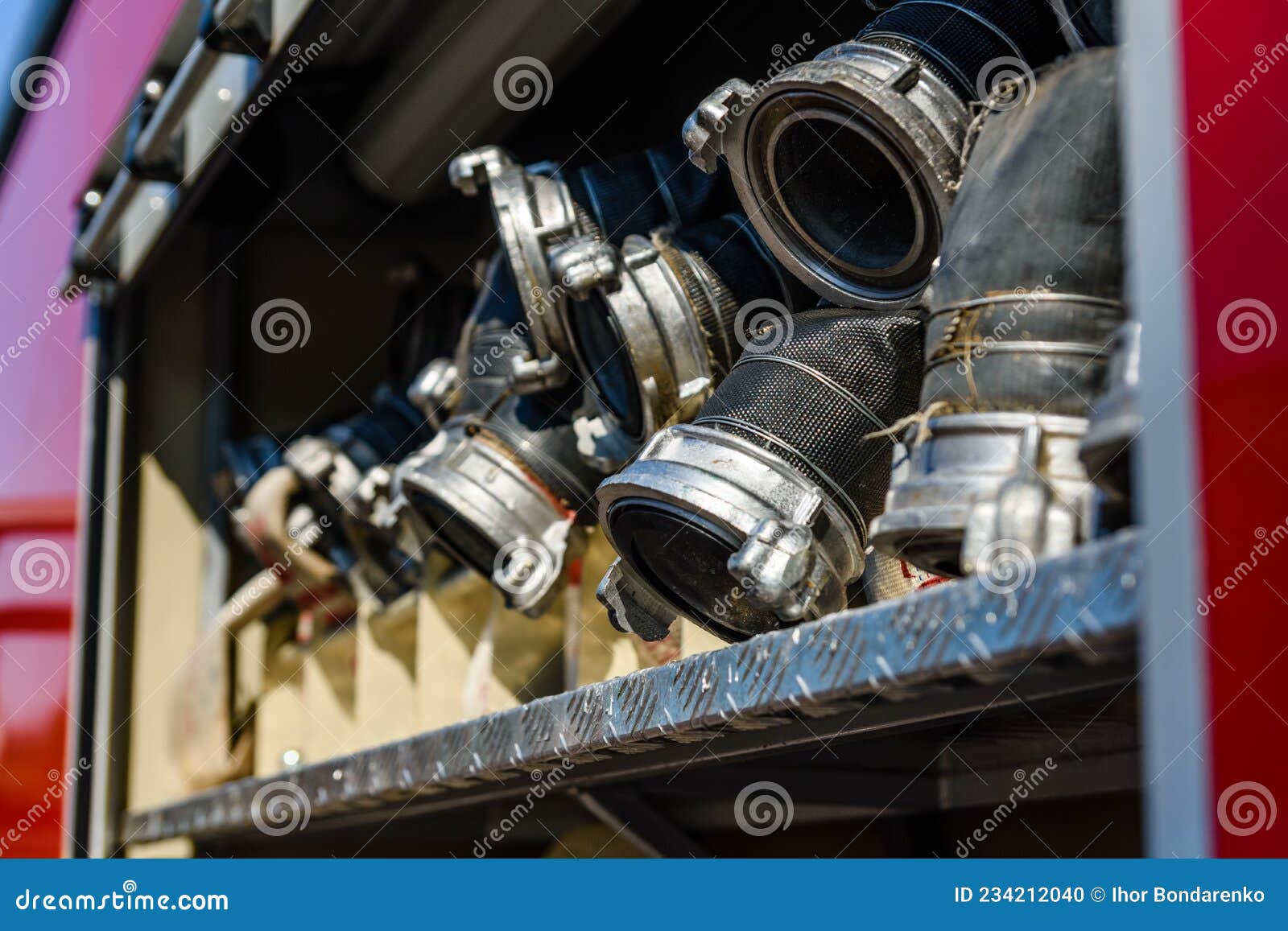 Closeup of the Modern Fire Truck with Firefighting Equipment Stock ...