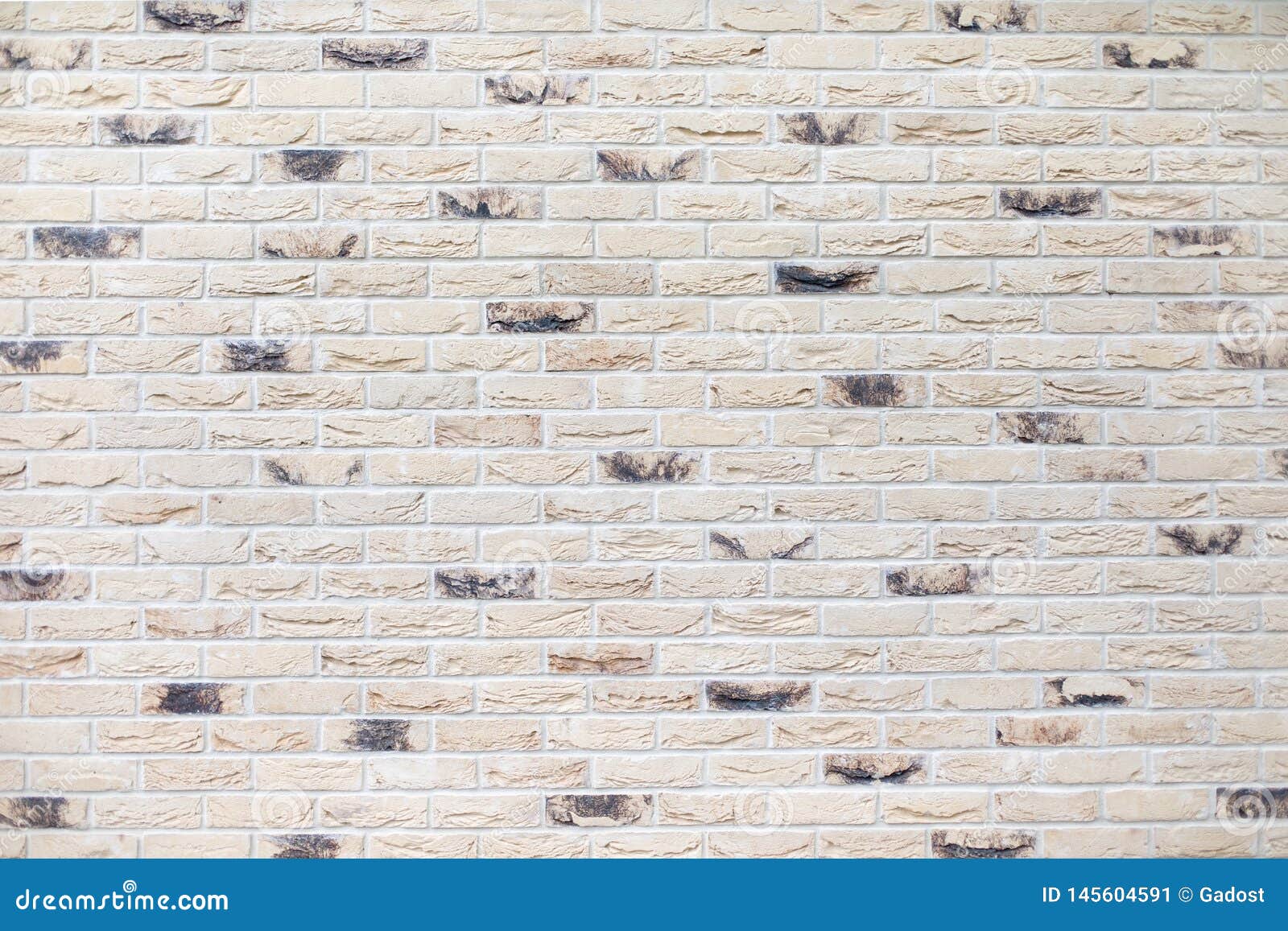 Closeup of Modern Neutral Beige Brick Wall with Dark Bricks Stock Image ...