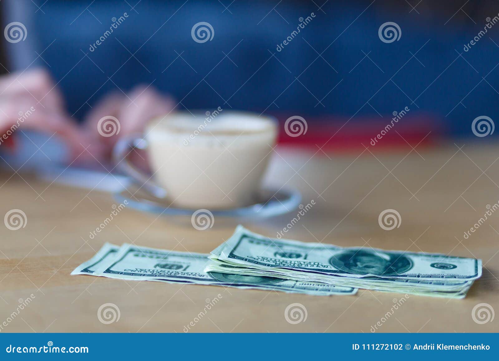 Closeup of Money on the Table. Money and Cup of Coffee on the Table ...