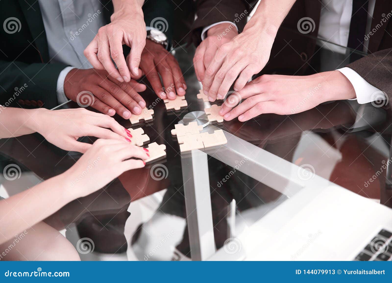 Close Up .multinational Business Team Assembling Puzzle. Stock Image ... Close Up .multinational Business Team Assembling Puzzle. Stock Image ...