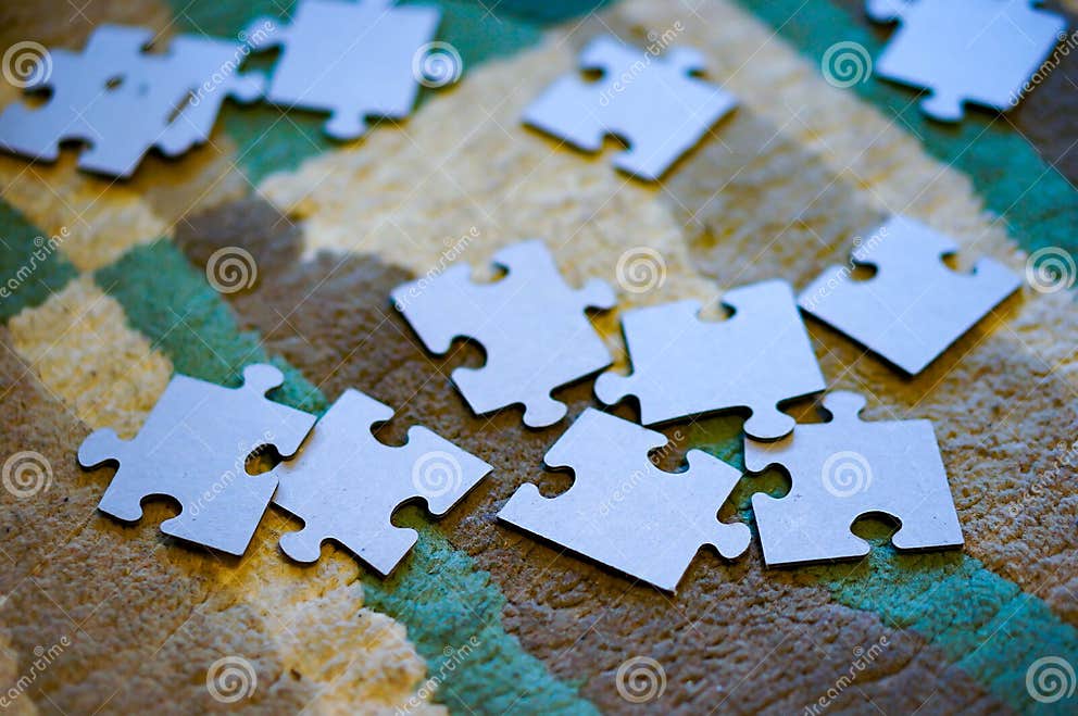 Closeup of Multiple Upside-down Puzzle Pieces Placed on a Colorful ...