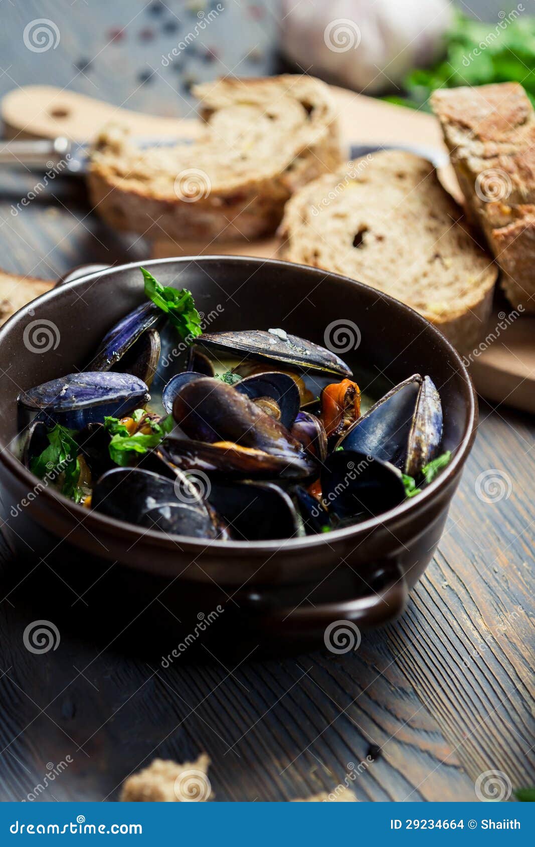 Closeup of Mussels Served with Bread Stock Photo - Image of grilled ...