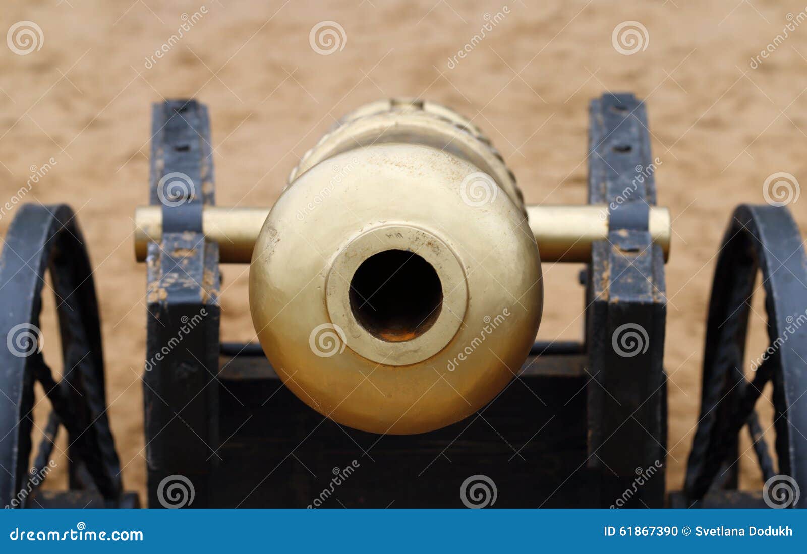 Closeup of Muzzle of Old Metal Cannon with Wheel on Sand Stock Photo ...