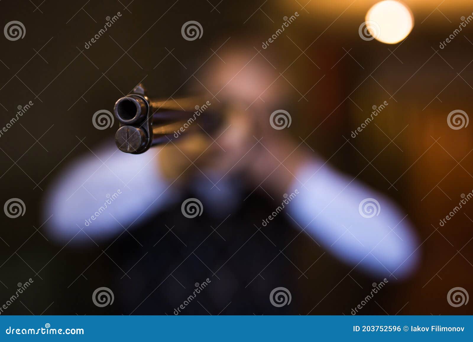 Muzzle of Single Barrelled Shotgun on Blurred Background of Aiming Man ...