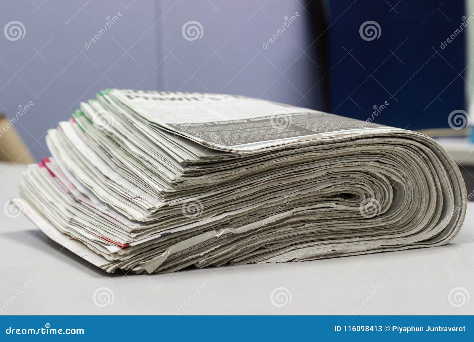 Closeup - Newspaper Stack stock image. Image of table - 116098413