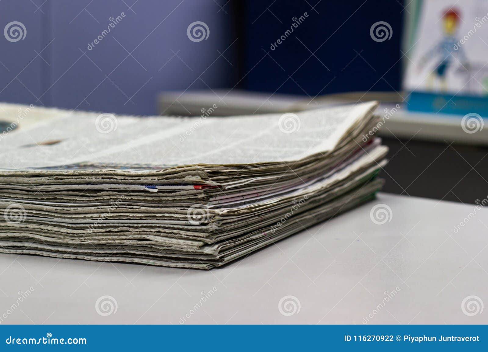 Newspaper Stack on White Table Stock Photo - Image of closeup, headline ...