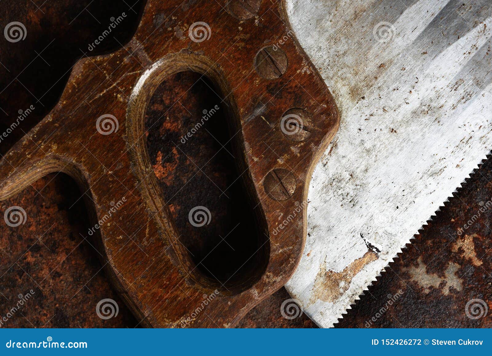 Closeup of an Old Hand Saw on a Rusty Metal Surface Stock Photo - Image ...
