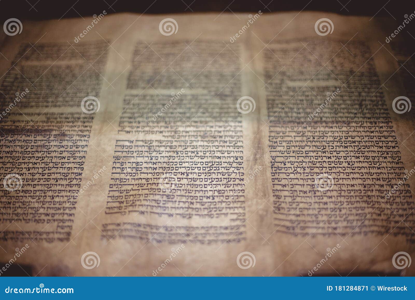 Closeup of an Old Hebrew Bible on the Table Under the Lights with a ...