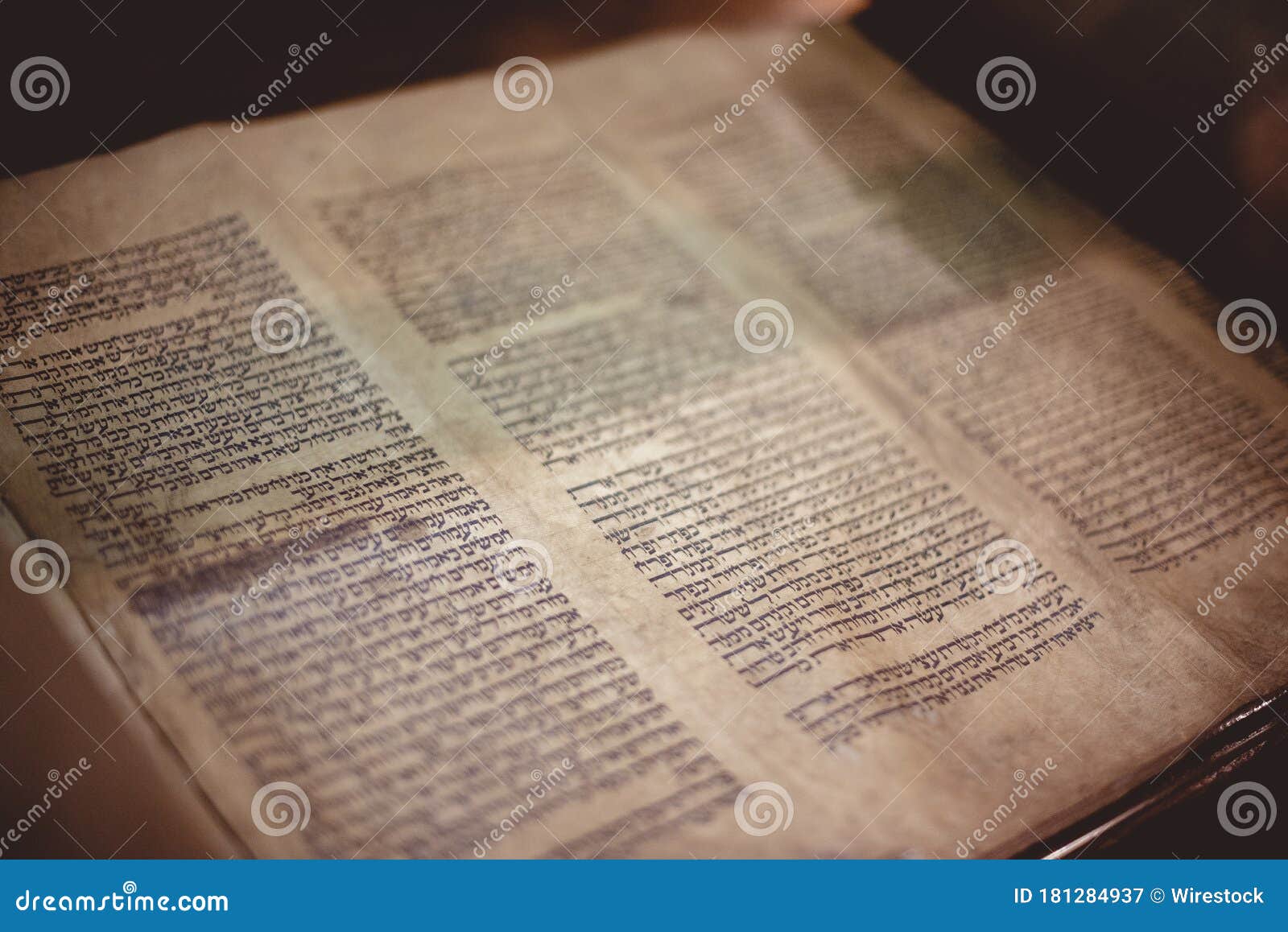Closeup of an Old Hebrew Bible on the Table Under the Lights with a ...