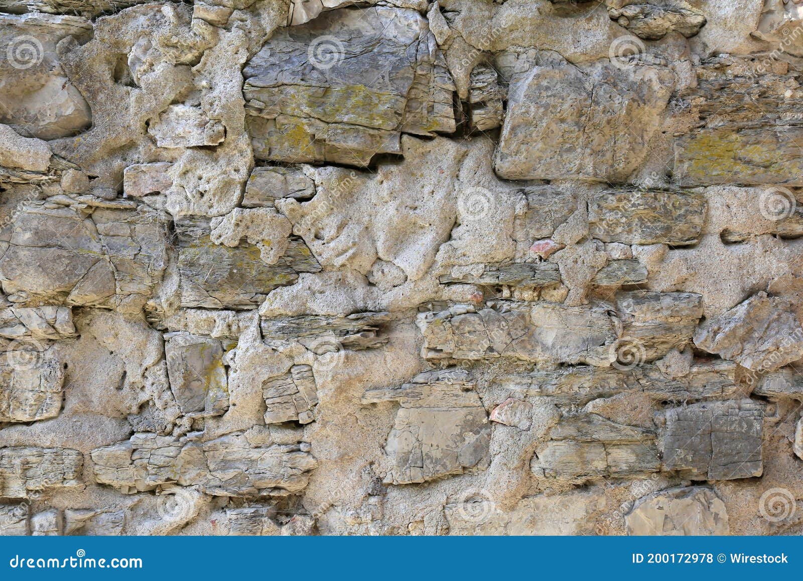 Closeup of an Old Rough Stone Wall Under the Sunlight Stock Photo ...