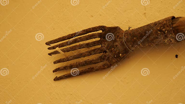 Closeup of an Old Rusty Fork on a Yellow Surface Stock Image - Image of ...