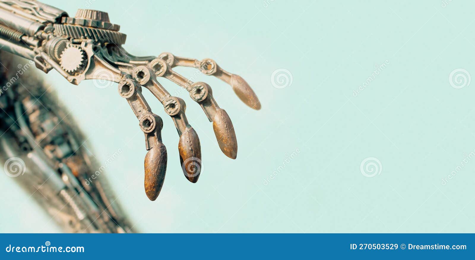 Closeup of an Old Rusty Robot Arm on a Blue Background Stock Image ...