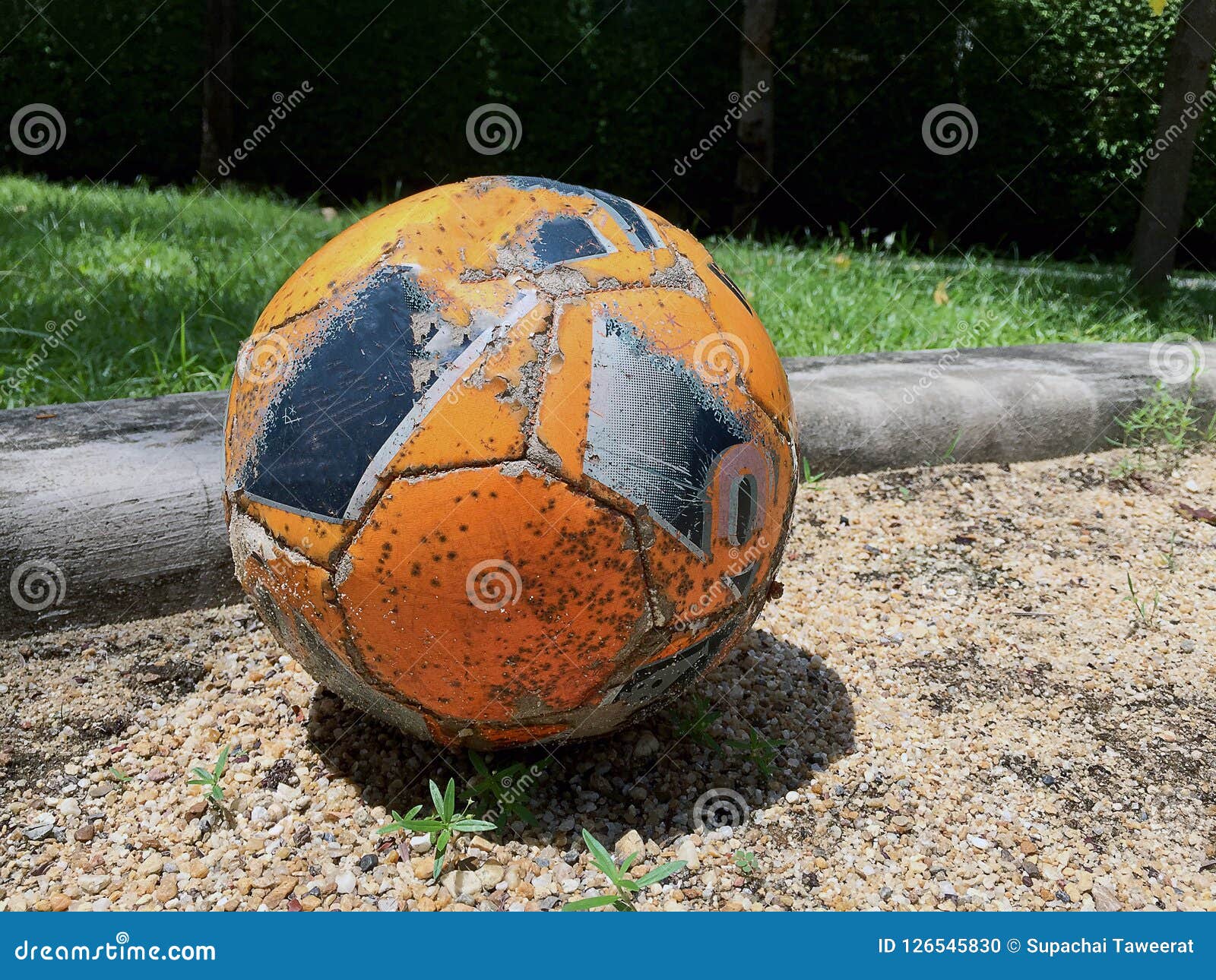 Closeup Old soccer ball stock photo. Image of grass - 126545830