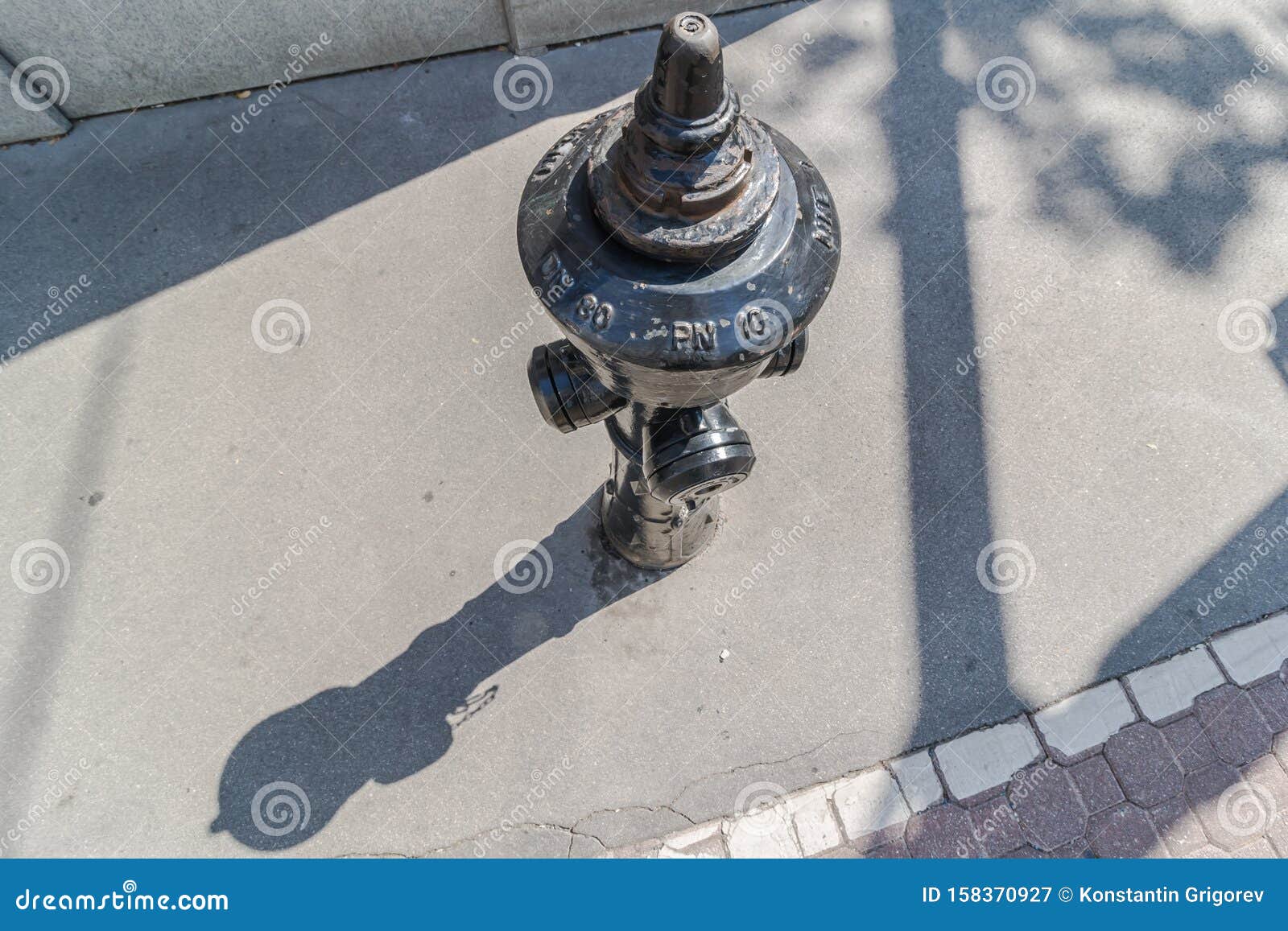 Closeup of Old Weathered Fire Hydrant on Street. Black Fire Hydrant ...