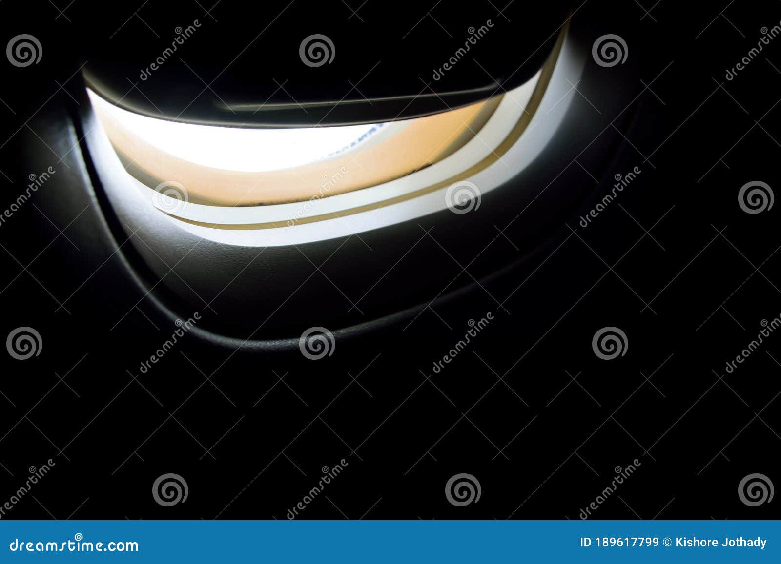 Closeup of an Oval Window of an Airliner with Shutter Pulled Down To ...