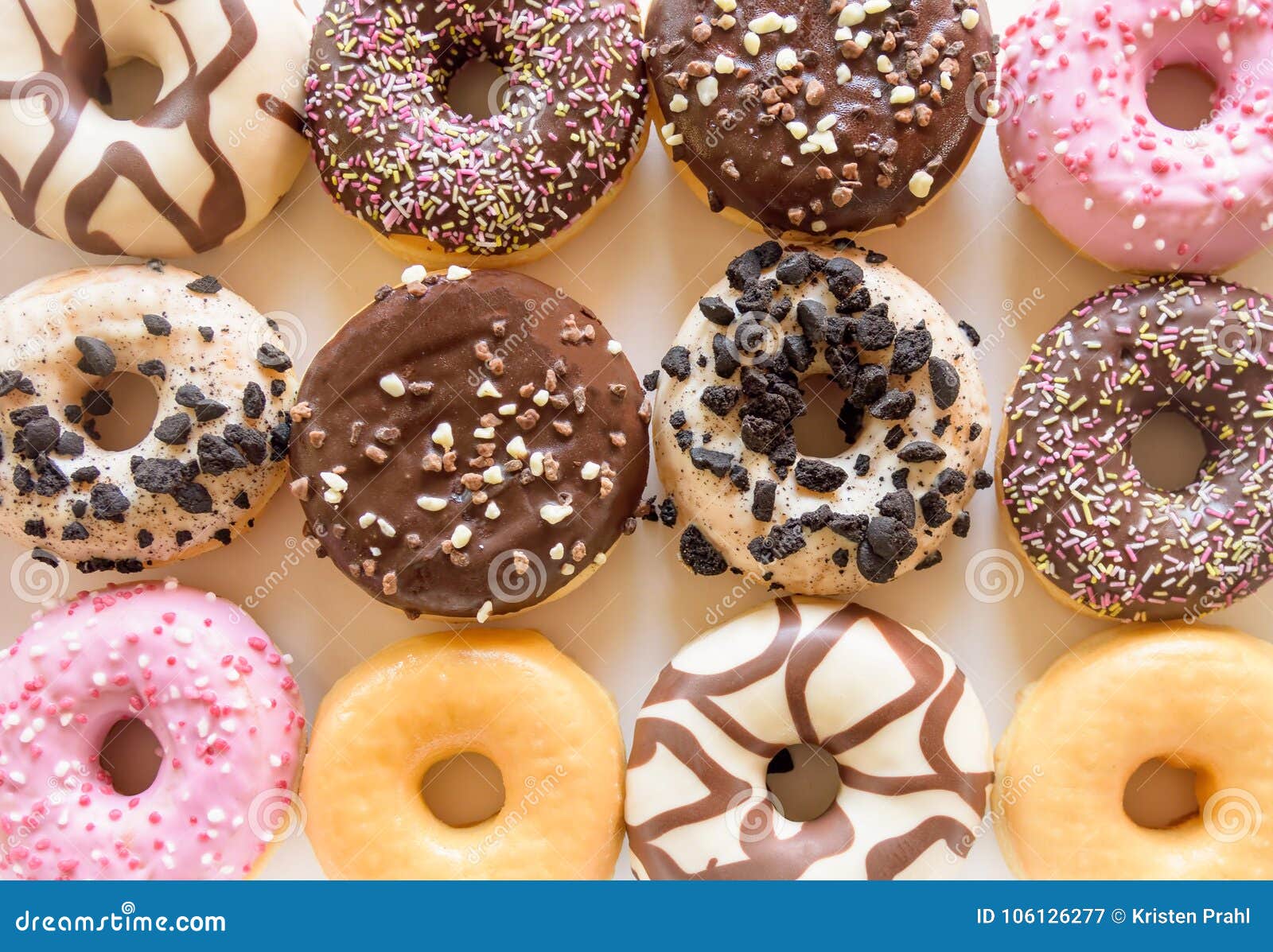 Closeup Overhead View of a Dozen Decorated Donuts Stock Image - Image ...