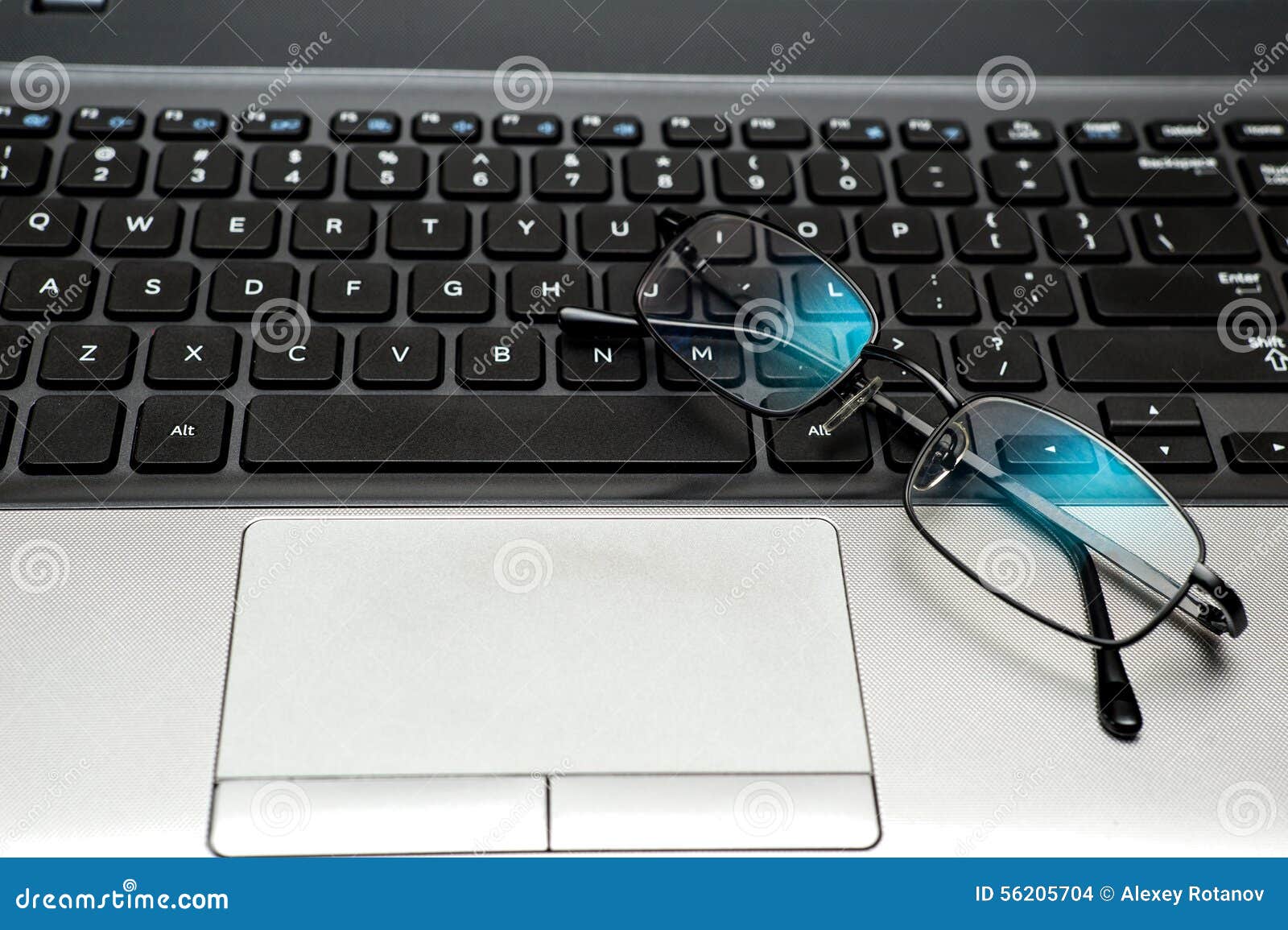 Closeup Pair of Glasses on the Laptop Keyboard Stock Photo - Image of ...