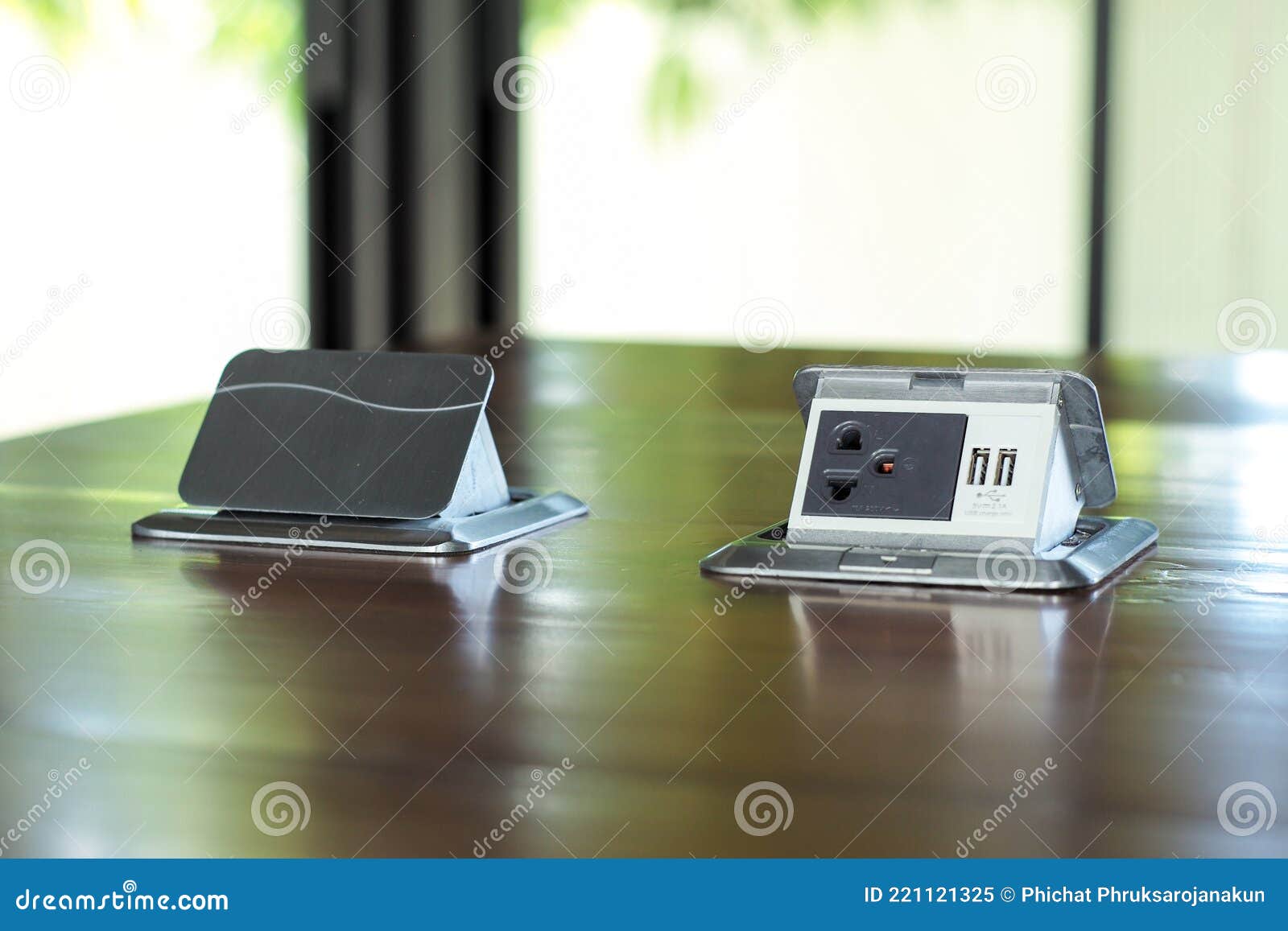 Closeup Pair of Pop Up Electrical Outlets Installed on the Surface of ...