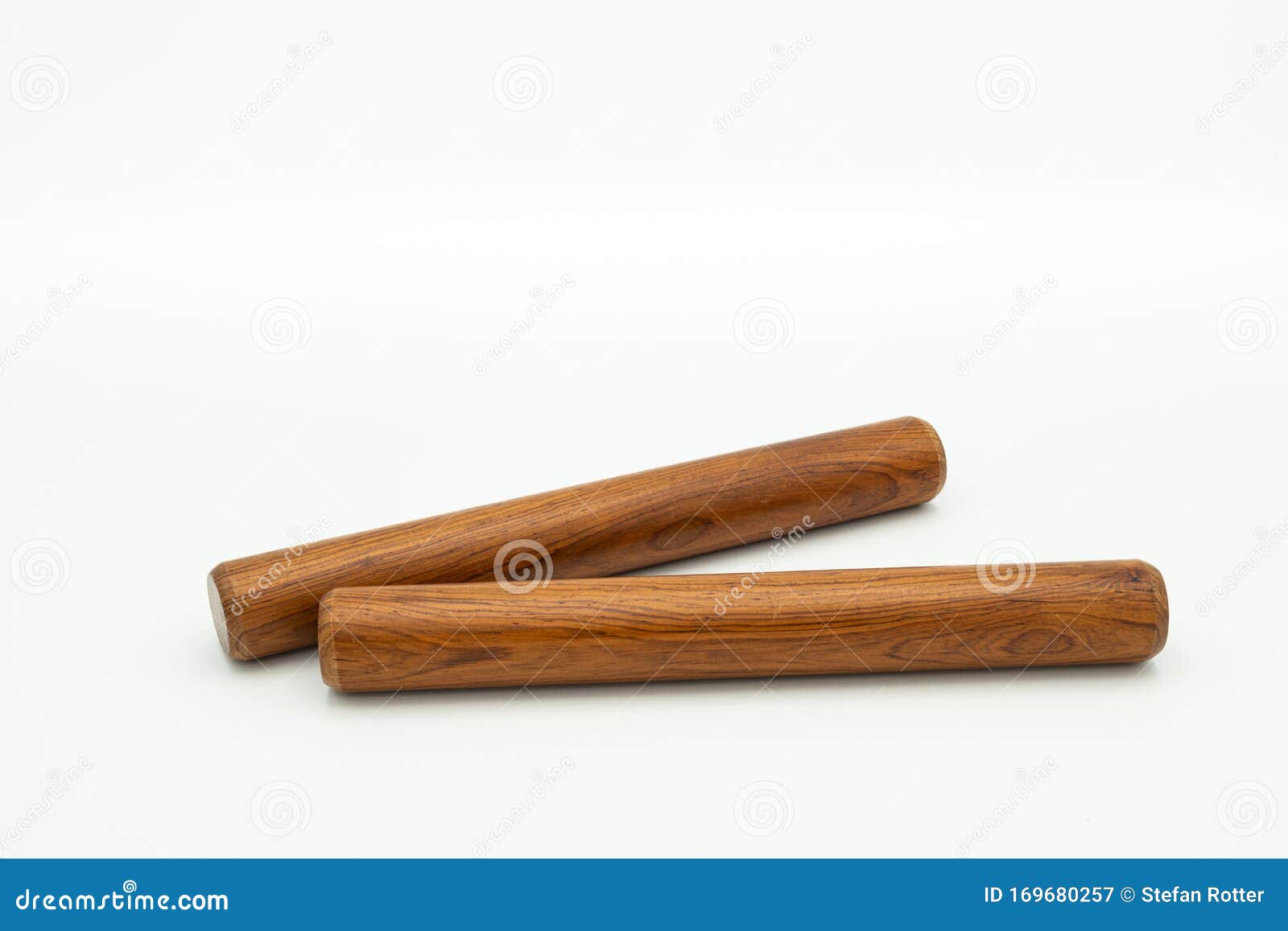 A Pair of Wooden Claves Lying on a White Underground Stock Image ...